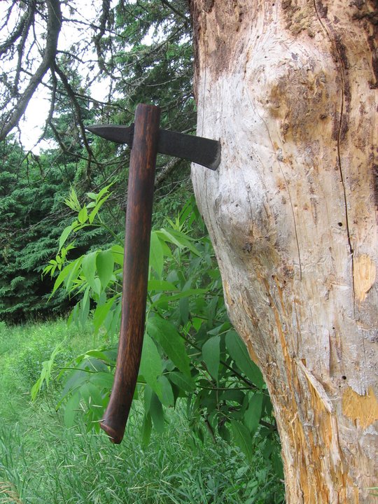 spike tomahawk. Made from a model T leaf spring, rawhide wraps with ...